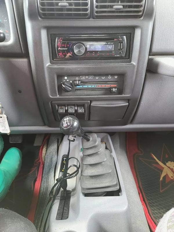 Crown Automotive AX5,AX15 Shifter Boot Bezel - 53000056AB | 4wheelparts.com