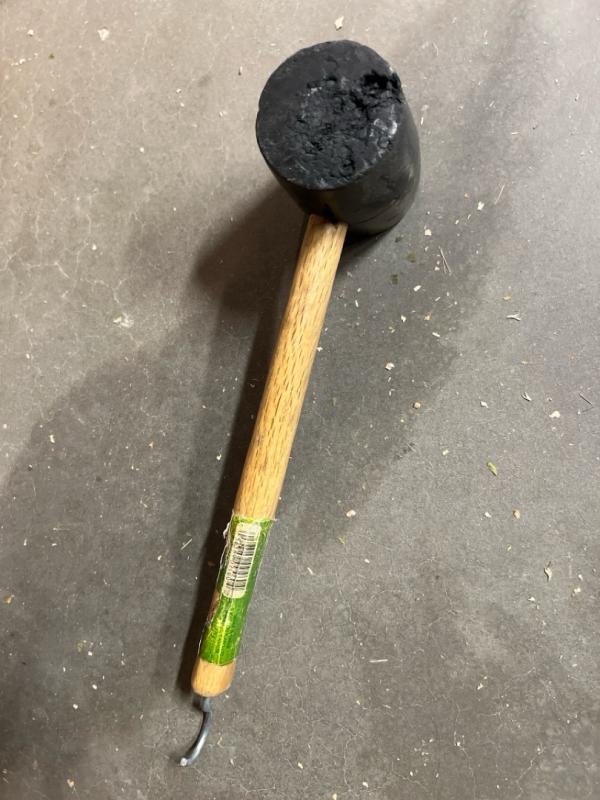 Coleman rubber mallet with tent peg remover store