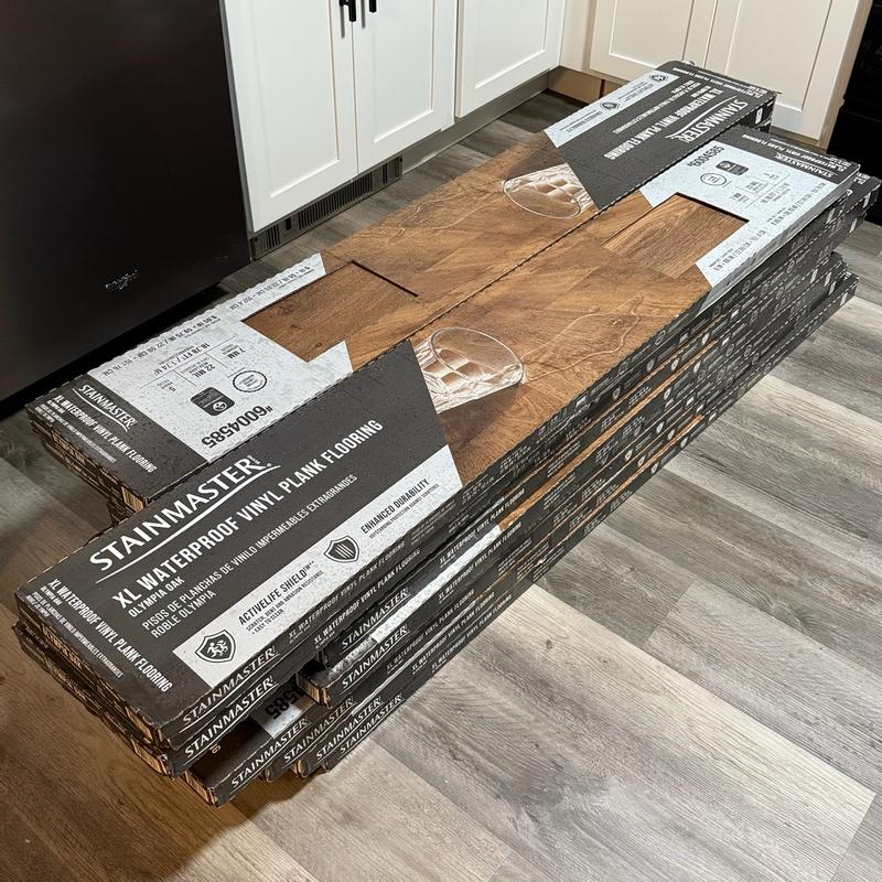 STAINMASTER Olympia Oak Brown 22-mil x 9-in W x 60-in L Waterproof ...