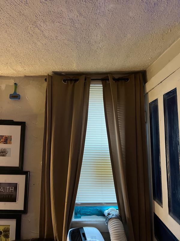 Eclipse Carey 48-in to 86-in Matte Black Steel Wrap-around Curtain Rod ...