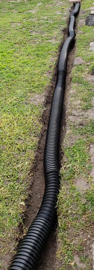 Amerimax Home Products FLEX Drain Pro 4 in. x 100 ft. Black Copolymer ...