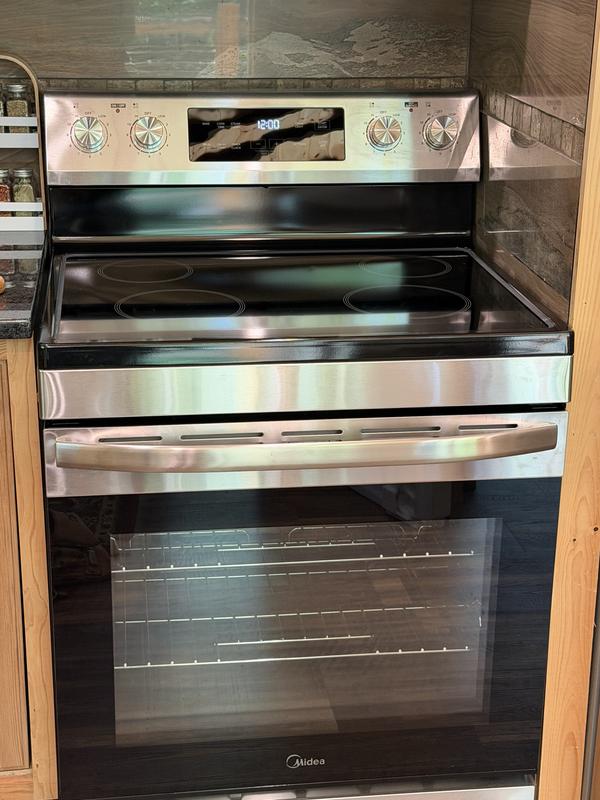 Shop Midea Midea 30-in Glass Top 4 Burners 6.3-cu ft Steam Cleaning ...