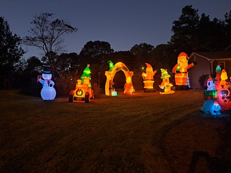 Grinch 9.5-ft LED Grinch Who-ville Arch Scene Christmas Inflatable ...