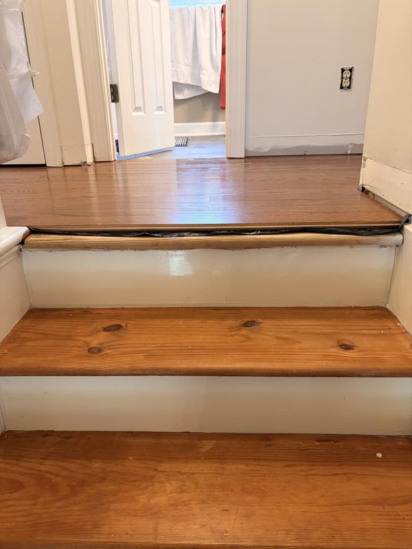 Bruce 2.75-in x 78-in x 0.3125-in Gunstock Prefinished Solid Wood Oak ...