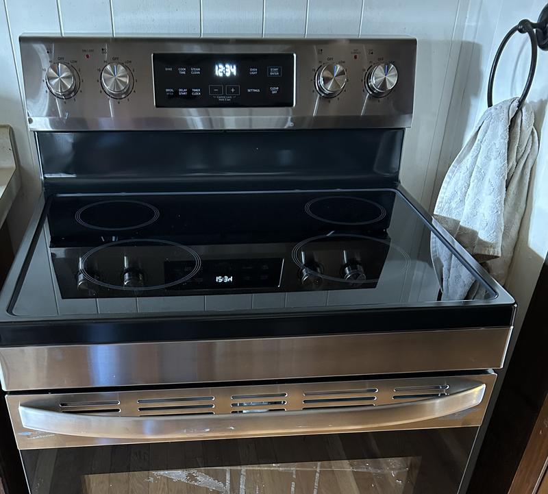 Midea 30-in Glass Top 4 Burners 6.3-cu ft Steam Cleaning Freestanding ...