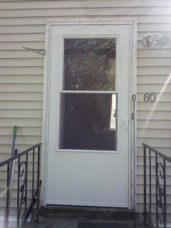 LARSON 20 Midview 36-in x 81-in White Wood core Reversible Hinge Storm ...