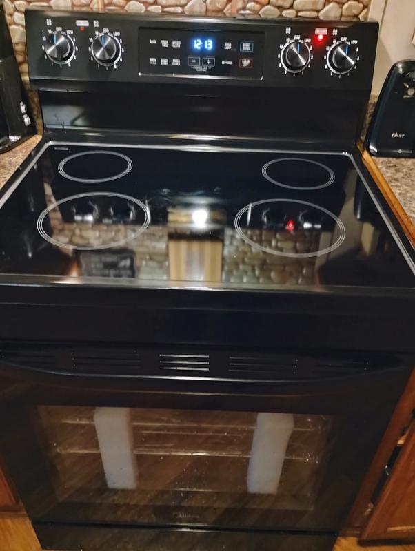 Midea 30-in Glass Top 4 Burners 6.3-cu ft Steam Cleaning Freestanding ...