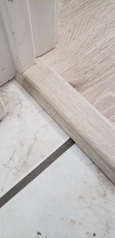 STAINMASTER Waterproof Vienna Basin Oak 12-mm T x 8-in W x 50-in L ...