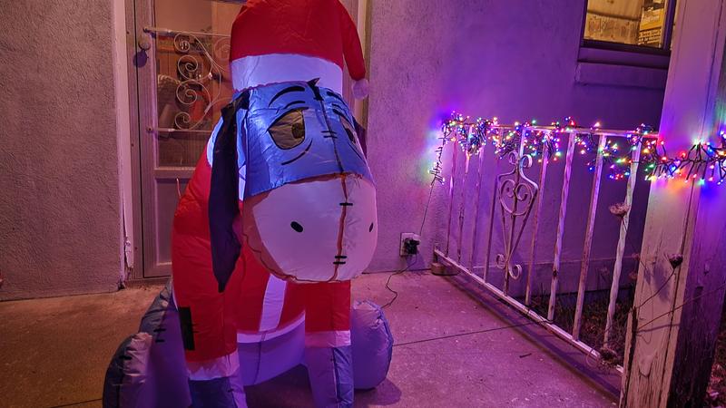 Disney 3.5-ft Lighted Disney Eeyore Santa Christmas Inflatable in the ...
