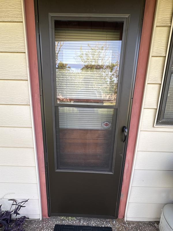 LARSON 20 Midview 30-in x 81-in Brown Wood core Reversible Hinge Storm ...