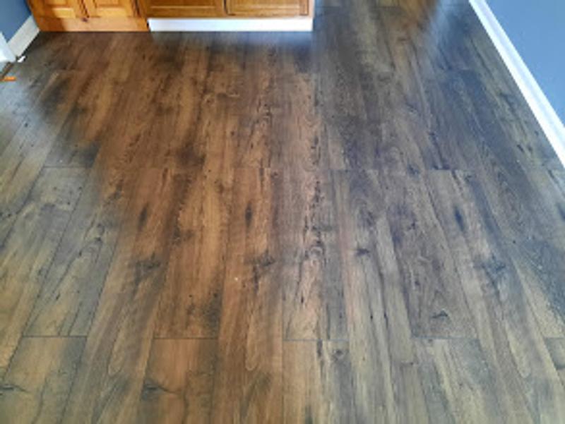 Pergo Portfolio + WetProtect Rustic Smoked Chestnut 10-mm T x 7-1/2-in ...