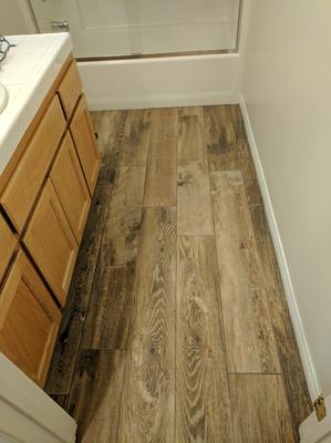 Style Selections Natural Timber Cinnamon 8-in x 48-in Glazed Porcelain ...