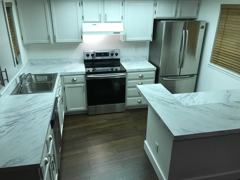 Wilsonart Premium 60-in W x 144-in L Calcutta Marble Patterned Kitchen ...