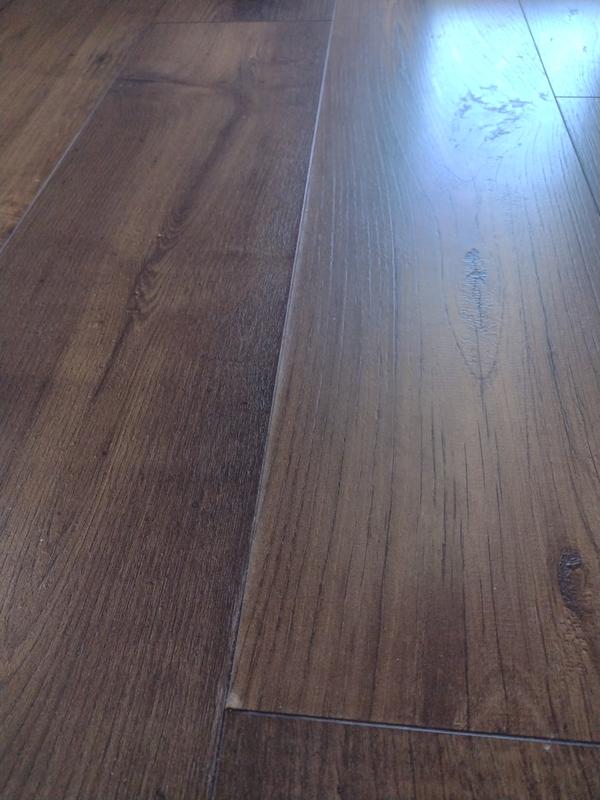 Pergo Portfolio + WetProtect Rustic Smoked Chestnut 10-mm T x 7-1/2-in ...