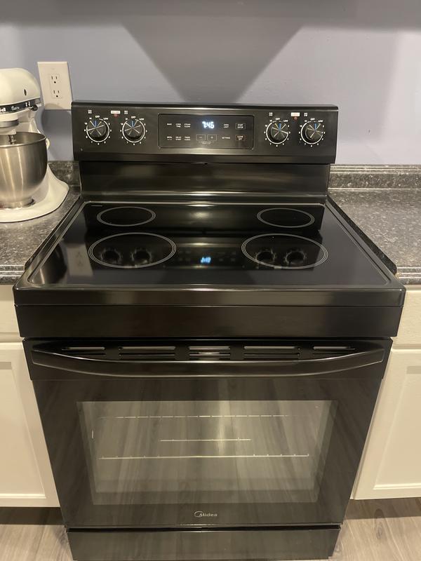 Midea 30-in Glass Top 4 Burners 6.3-cu ft Steam Cleaning Freestanding ...