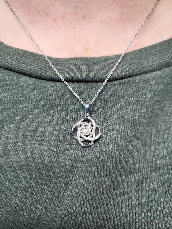 0.115 CT. T.W. Diamond Love Knot Pendant in Sterling Silver 0.115 CT. T.W. Diamond Love Knot Pendant in Sterling Silver