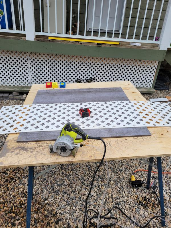 Ryobi tile saw 4 inch hand held wet corded ceramic paver stone cutting cut tool store