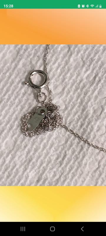 1/8 CT. T.W. Diamond Loop Cross Pendant in 10K White Gold 1/8 CT. T.W. Diamond Loop Cross Pendant in 10K White Gold