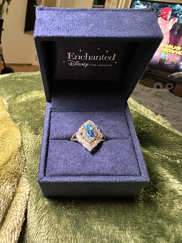 Enchanted Disney Aladdin Pear Shaped Swiss Blue Topaz and 1 10 CT. T.W. Diamond Arabesque Frame Ring in 10K Gold Zales